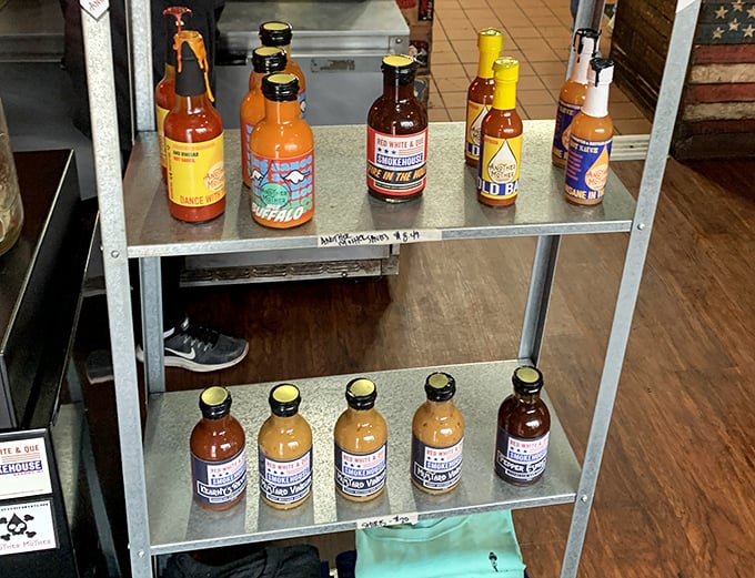 The sauce lineup – because sometimes you want options, even when the meat is perfect on its own. Each bottle holds liquid personality waiting to meet your brisket.