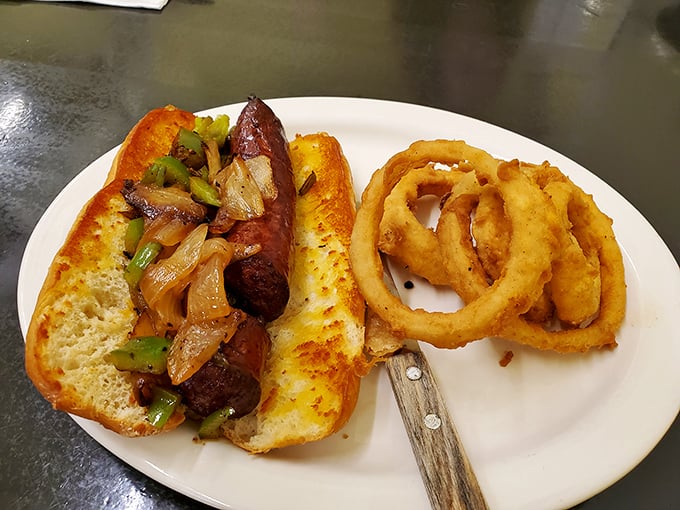 This sausage hoagie with grilled peppers and onions isn't just a sandwich—it's lunch with ambition and a side of perfectly golden rings.