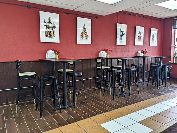 The dining area—simple, functional, with Cleveland landmarks watching over your meal like proud parents.