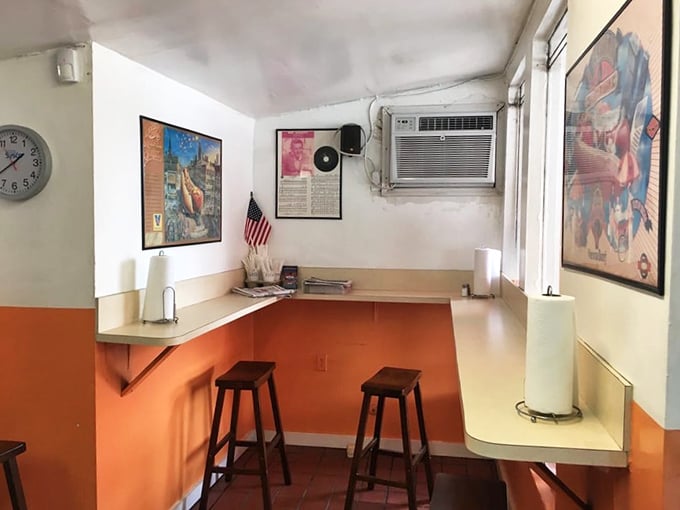 Indoor seating that says, "We care more about our food than our furniture." The vintage posters aren't decoration—they're time machines.