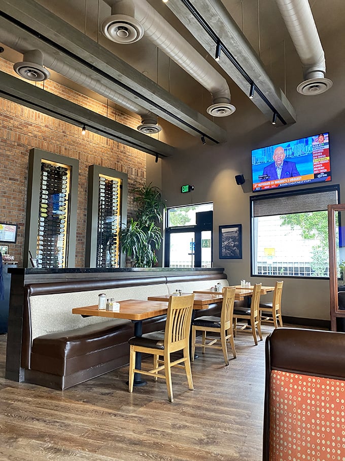 Comfortable booths beneath impressive wine displays invite lingering conversations. The perfect spot to debate whether to order dessert (spoiler: you should).
