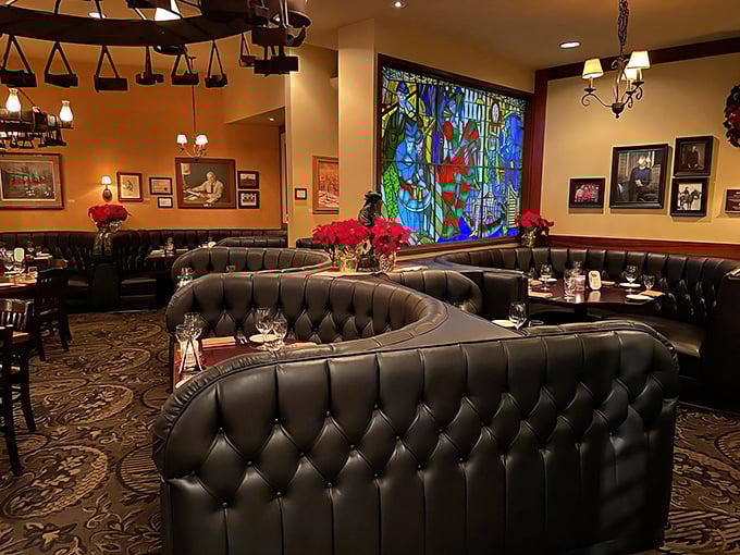 Leather booths cradle you like a luxury car seat while stained glass adds unexpected splashes of color to this temple of beef.