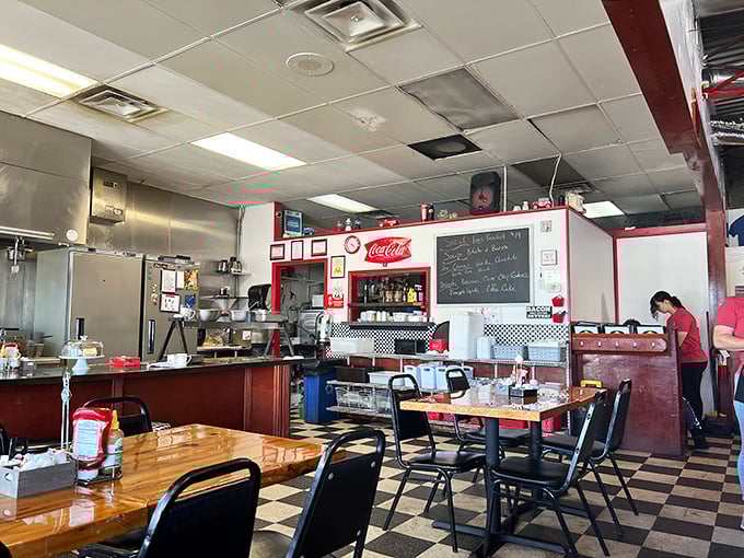 Another view of the dining area shows the perfect balance of retro charm and practical comfort—where conversations flow as freely as coffee.