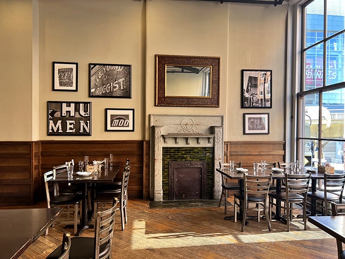 Sunlight streams through historic windows, casting a warm glow on wooden tables. This isn't just dining—it's a scene from a Kentucky postcard.