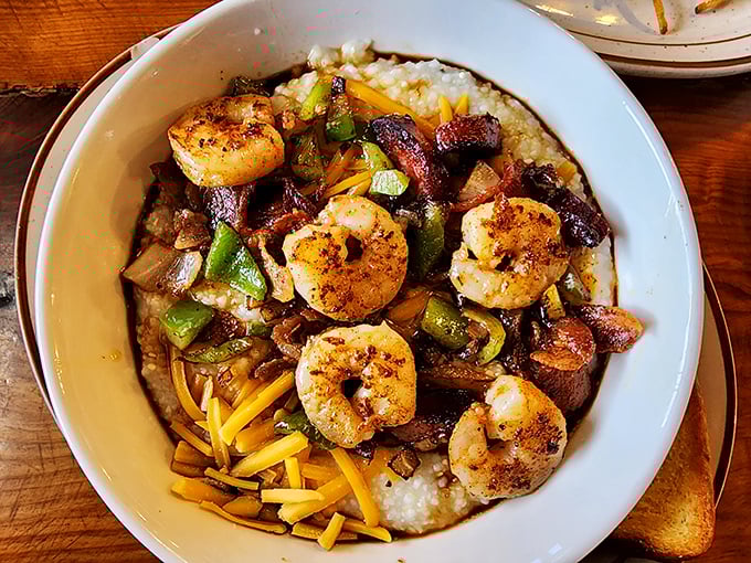 Shrimp and grits elevated to an art form – plump crustaceans lounging on a bed of cheesy goodness like they're at a five-star resort.