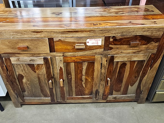 This isn't just a sideboard—it's a masterclass in woodworking, with grain patterns more captivating than most streaming shows. 