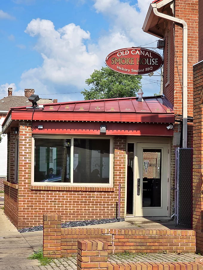 The sign promises "Hickory Smoked BBQ" and inside, they're keeping that promise with religious devotion. Hallelujah!