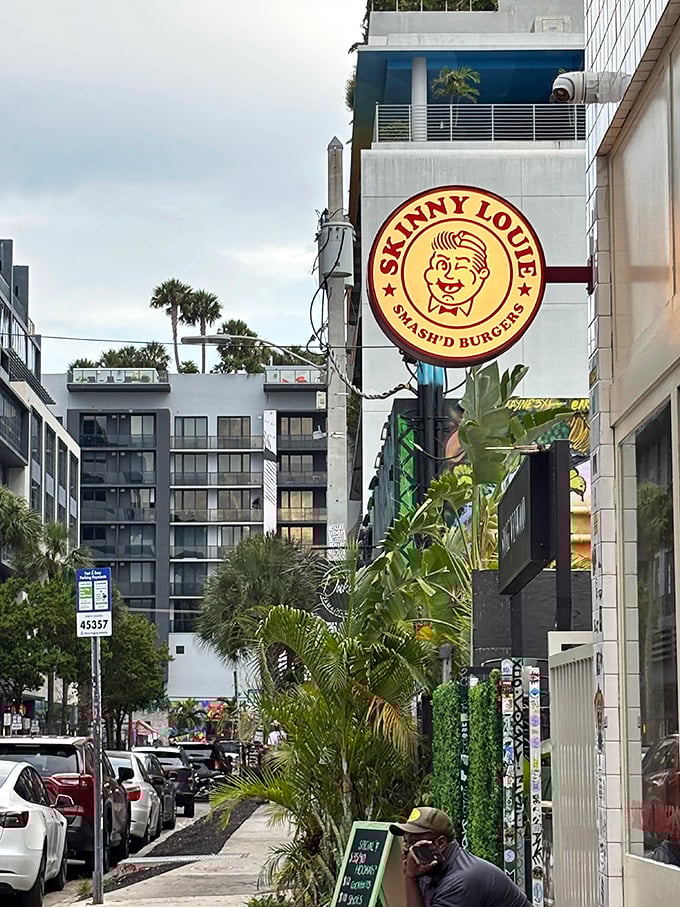 That circular sign with its cheeky character is like a wink to those in-the-know about Miami's burger scene.