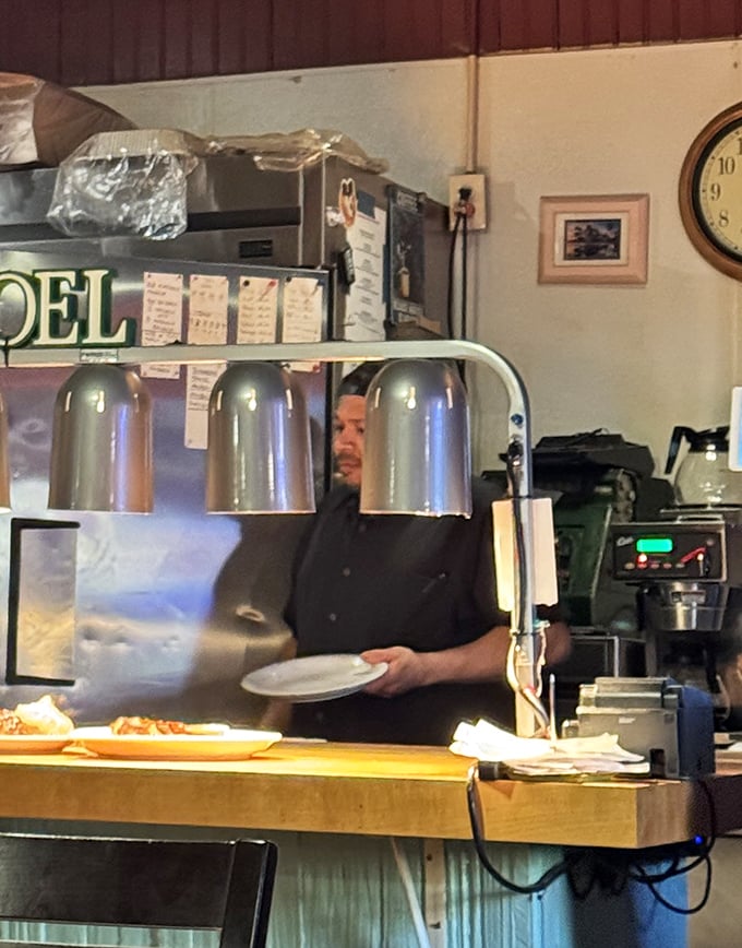Behind the scenes, where the magic happens—a glimpse into the kitchen that explains why the food arrives with that unmistakable homemade quality.