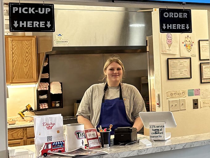 The smile behind the counter says it all – you're not just getting food here, you're getting a slice of Scottsbluff hospitality.
