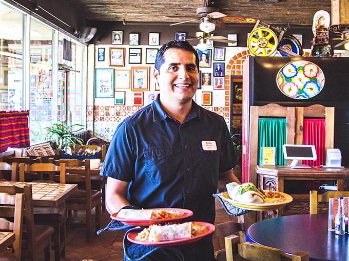 The staff carries plates like Olympic torchbearers – proud, careful, and aware they're delivering something that will ignite joy.