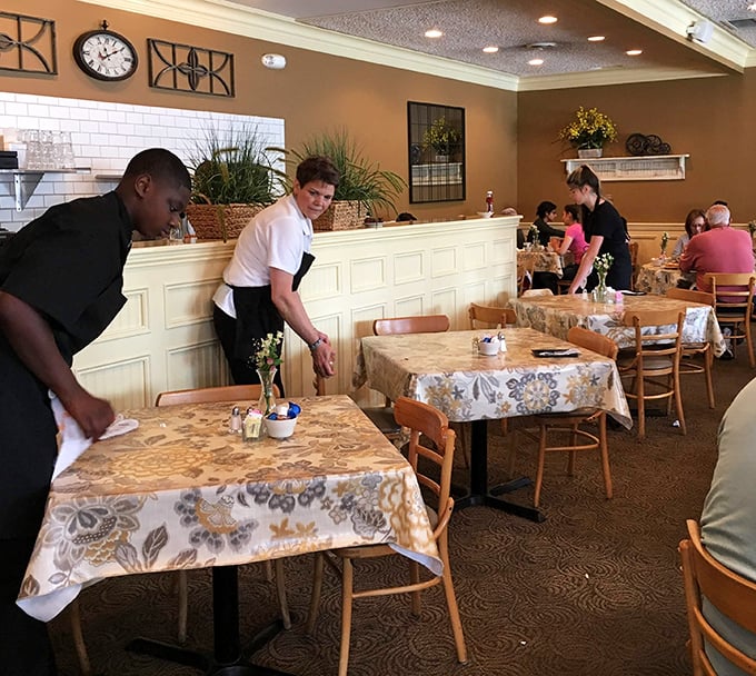 The staff moves with the practiced efficiency of breakfast ballet dancers—clearing, serving, and making sure no coffee cup sits empty for long.