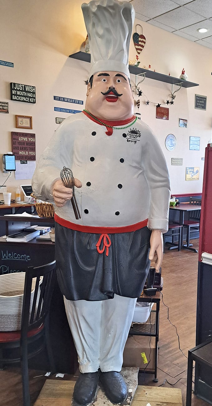 Not all restaurant mascots are created equal—this chef statue stands guard like the patron saint of perfectly cooked eggs and unlimited coffee refills.