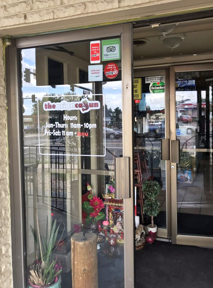 Business hours posted clearly—because knowing when you can get your seafood fix is essential life information in Denver.