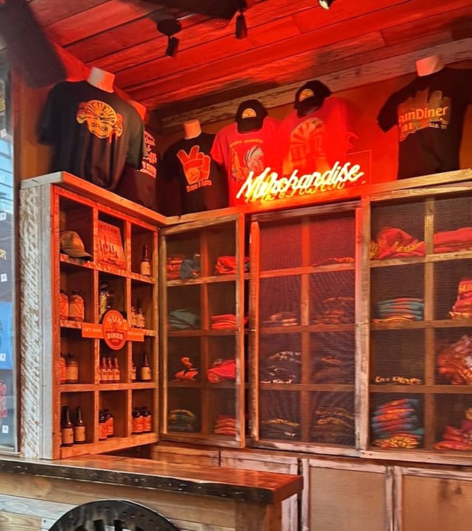 Merchandise display glowing under neon lights – take home a souvenir from your new favorite breakfast destination.