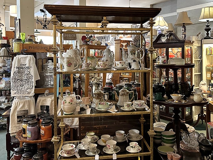 Tea sets arranged like a Victorian social hierarchy—the fancy bone china clearly outranking the everyday pottery in this delicate pecking order.