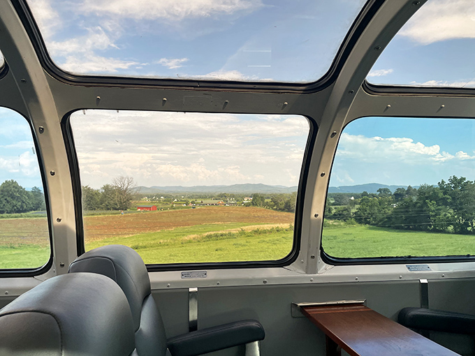 The panoramic windows frame Virginia farmland like living paintings—proving that sometimes the journey truly is the destination. Photo credit: Michael Garton