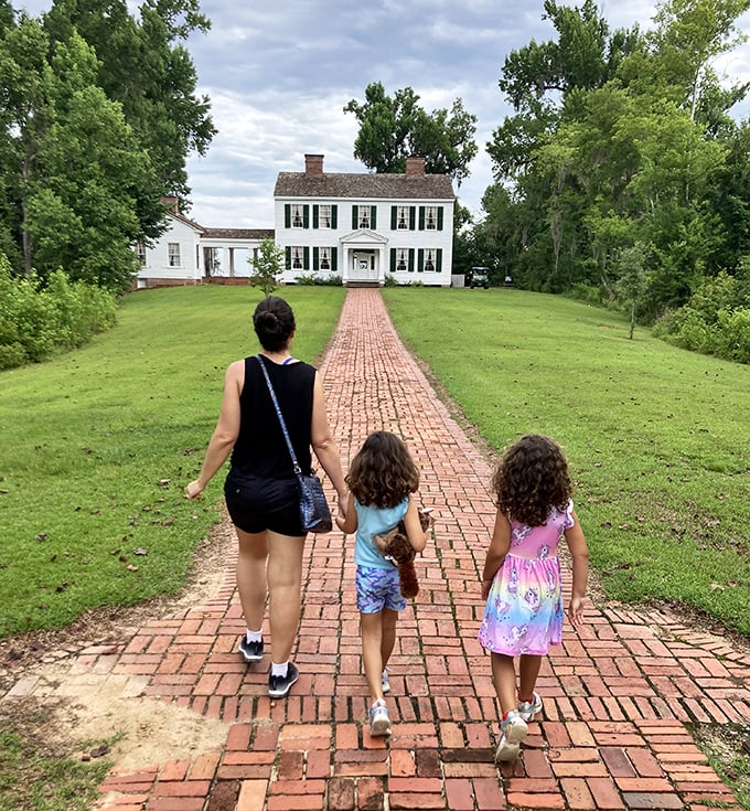 The brick path to history. Families discover the Gregory House together, creating new memories while exploring Florida's past.