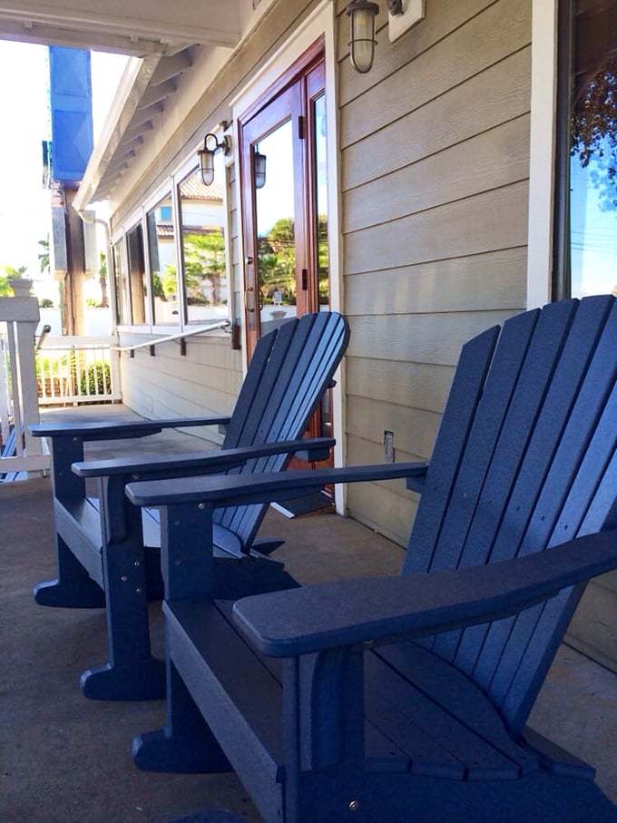 Those Adirondack chairs on the porch say "sit a spell" – the universal Southern invitation to slow down and digest properly.