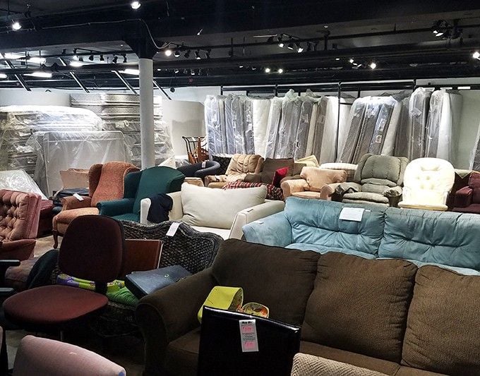 Sofa city! This furniture gathering looks like a living room support group—each piece hoping to find its forever home.