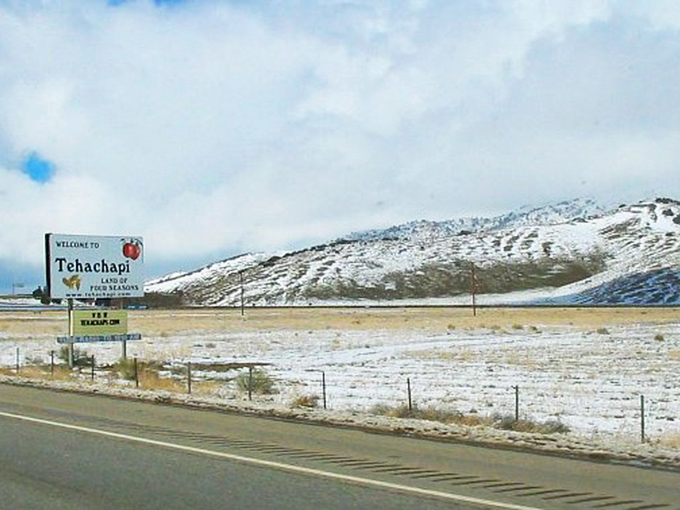 Tehachapi's welcome sign hints at the affordable mountain paradise beyond, where your Social Security check stretches as far as the views.