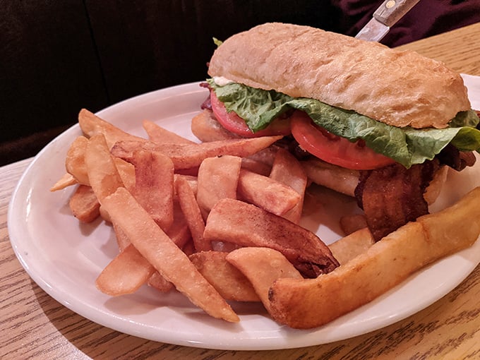 A sandwich that requires both hands and several napkins – the universal sign of something worth every messy bite.