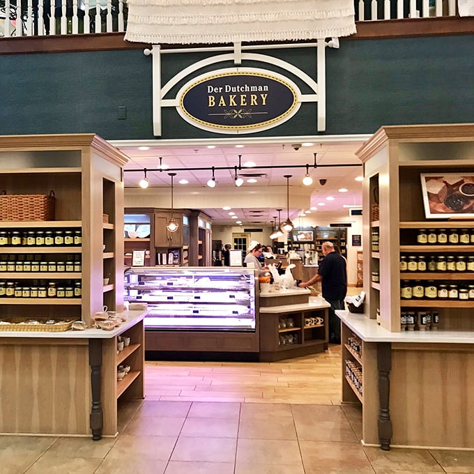 The bakery entrance beckons with promises of carbohydrate heaven – resistance is both futile and foolish.