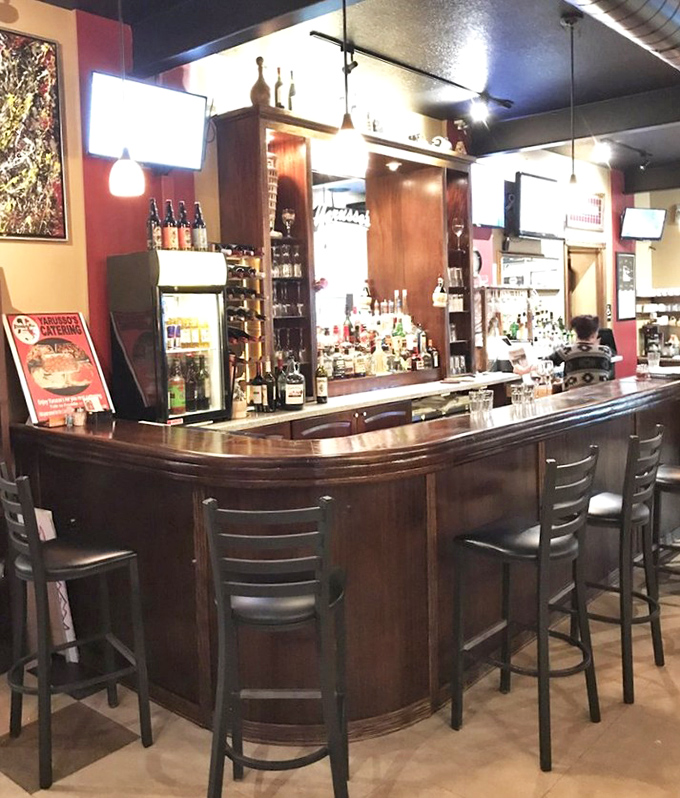 The bar stands ready to pour liquid courage for anyone attempting to finish their entire entrée in one sitting.