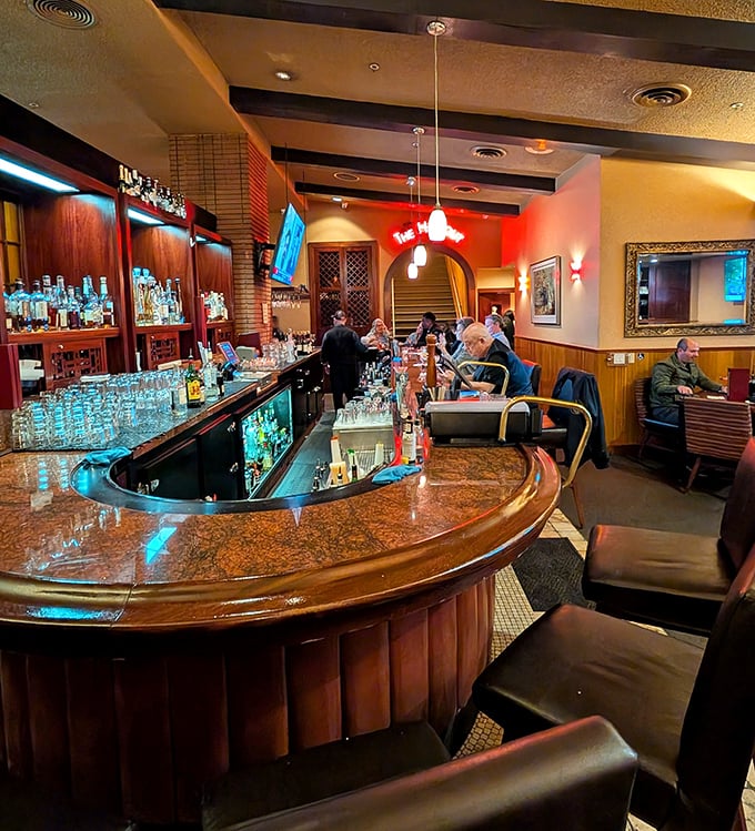This isn't just a bar – it's a liquid library where bartenders serve history by the glass, under the warm glow of perfectly dimmed lights.