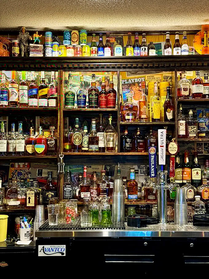 The well-stocked bar proves that great barbecue deserves equally great libations—because nothing complements smoke and spice like a cold one.