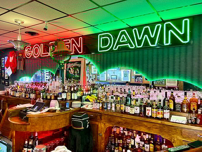 The circular bar is the heart of Golden Dawn, where bartenders pour with precision and regulars debate everything from politics to playoff chances.