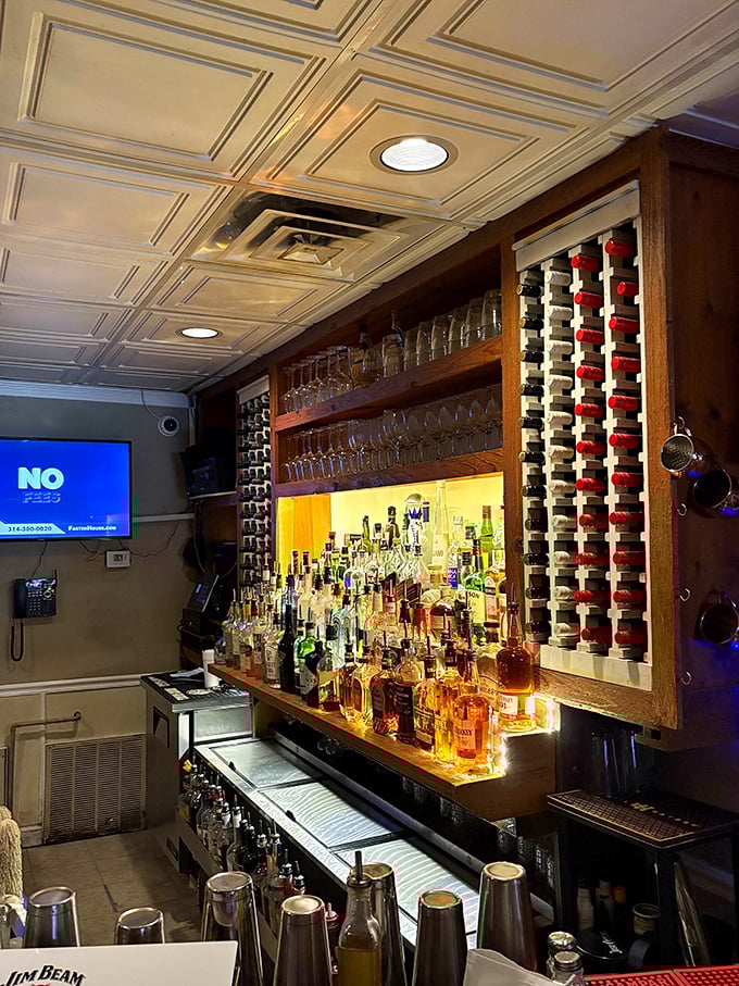 This isn't just a bar—it's a shrine to libations where wine bottles stand at attention, ready to complement your toasted ravioli adventure.