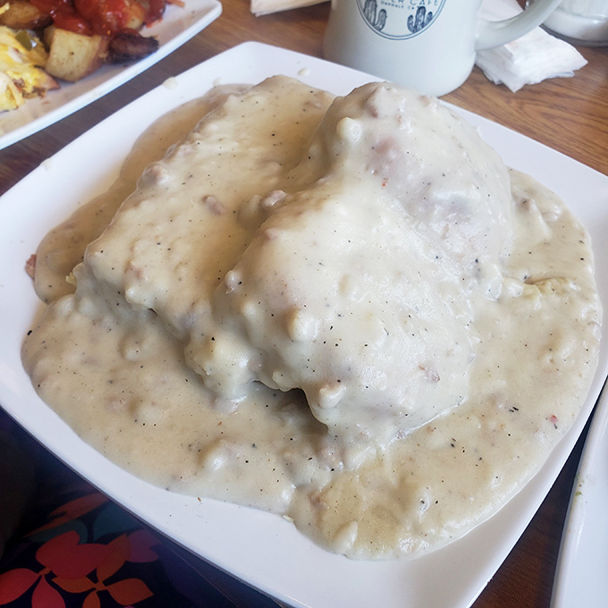 Biscuits and gravy that don't just sit on the plate but command it—a monument to Southern influence in California cuisine.