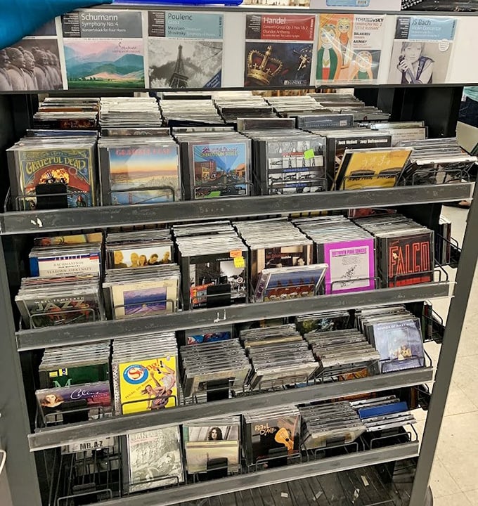 Musical memories stacked neatly in plastic. From Schumann to Grateful Dead—someone's discarded soundtrack might become your new favorite album.