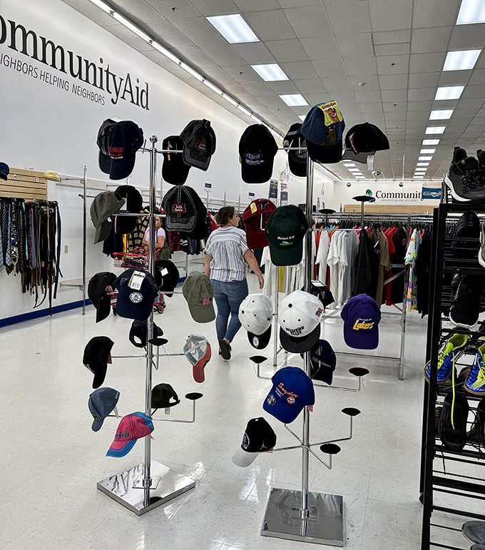 The hat display: where sports loyalties, vacation memories, and fashion statements hang in suspended animation until claimed by the perfect head.