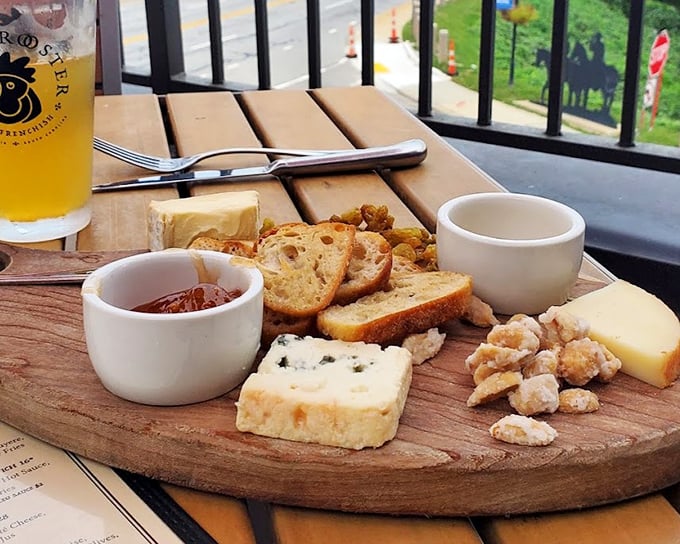 The cheese board arrives like a well-curated art exhibit—each wedge, spread, and accompaniment telling its own delicious story.