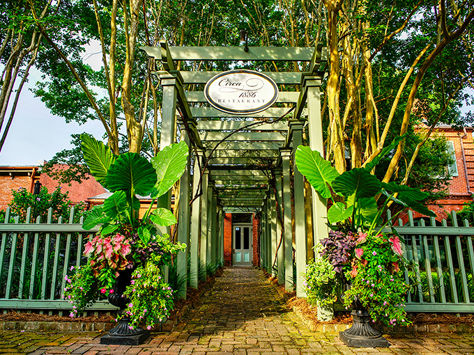 The entrance to Circa 1886 promises a dining experience as lush as the foliage that frames it – Southern hospitality with a side of enchantment.