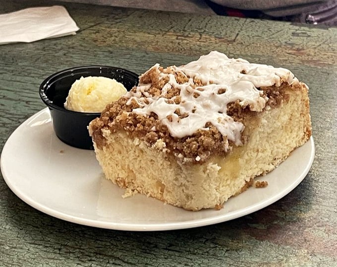 Coffee cake that makes you question why you'd ever waste calories on lesser desserts – streusel-topped perfection served with a side of pure joy.