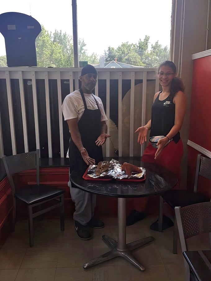 The heart and soul of Fish And More: dedicated staff preparing food with care that you can taste in every bite.