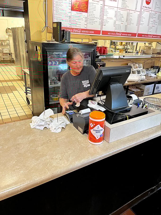Where the magic happens—the counter where orders are taken, tickets are hung, and diner symphonies are conducted daily.