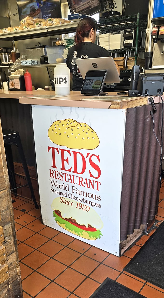 At the counter, life-changing decisions await: single or double? Extra cheese? Will your pants forgive you tomorrow?
