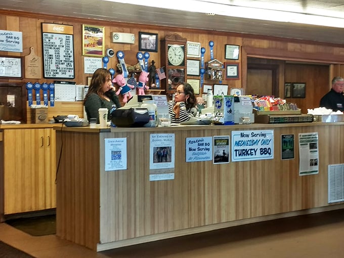 The counter where barbecue dreams become reality. Those blue ribbons on the wall aren't just decorations—they're the credentials of smoke mastery.