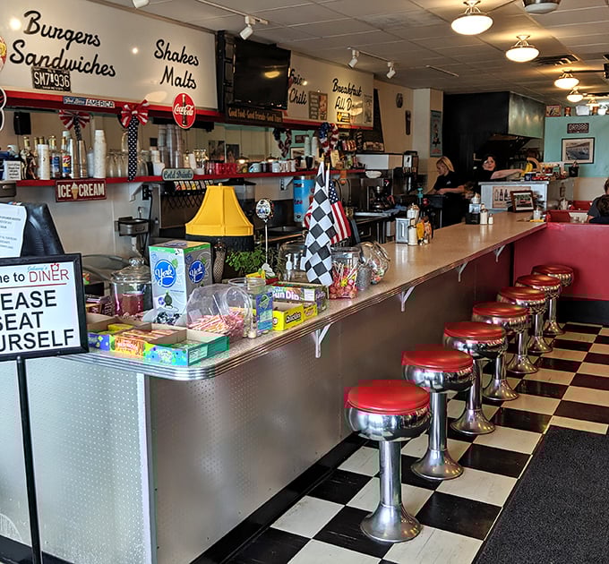 The counter is diner democracy in action – where solo diners, couples, and regulars all get front-row seats to the breakfast show.