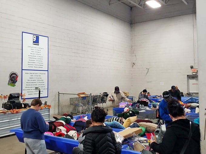 Serious thrifters study the posted rules and pricing charts before diving in—this isn't amateur hour at the outlet store.