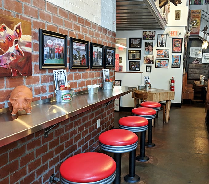 Counter seating with those iconic red stools—where solo diners never feel alone because the food keeps them company.