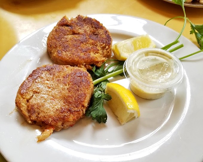 Crab cakes with the perfect ratio of crab to binding—mostly crab, just enough "other stuff" to hold it together. That golden crust deserves a standing ovation.