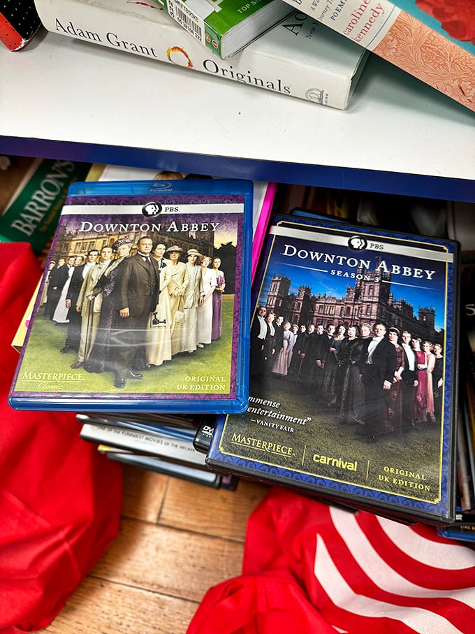 Downton Abbey Blu-rays waiting for their next binge-watching weekend. British drama without the aristocratic price tag – how revolutionary!