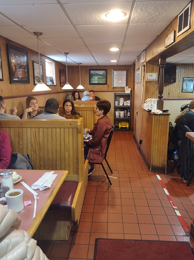 The dining room hums with conversation—a community center disguised as a restaurant where Pittsburgh solves its problems.