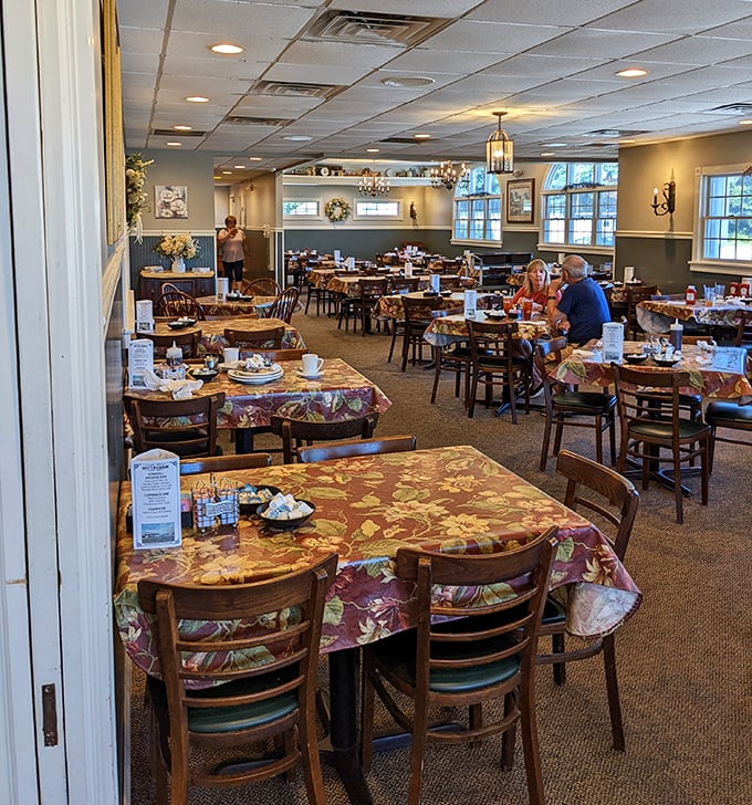 A dining room humming with the satisfied murmurs of regulars. Those floral tablecloths have witnessed countless family celebrations and first dates.