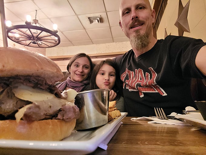 A family moment captured mid-meal—proof that Dodge City creates memories alongside its burgers and steaks.